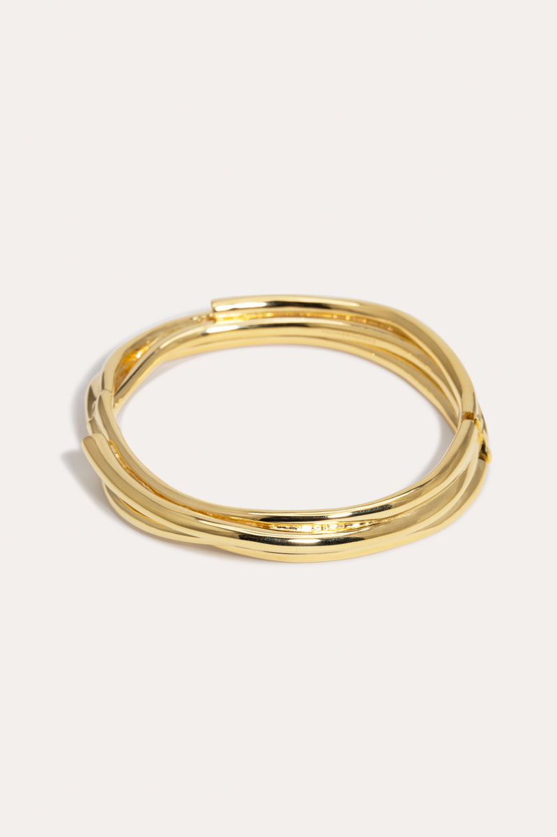 The Shifting Ground Beneath Our Feet - Gold Plated Bangle | Completedworks